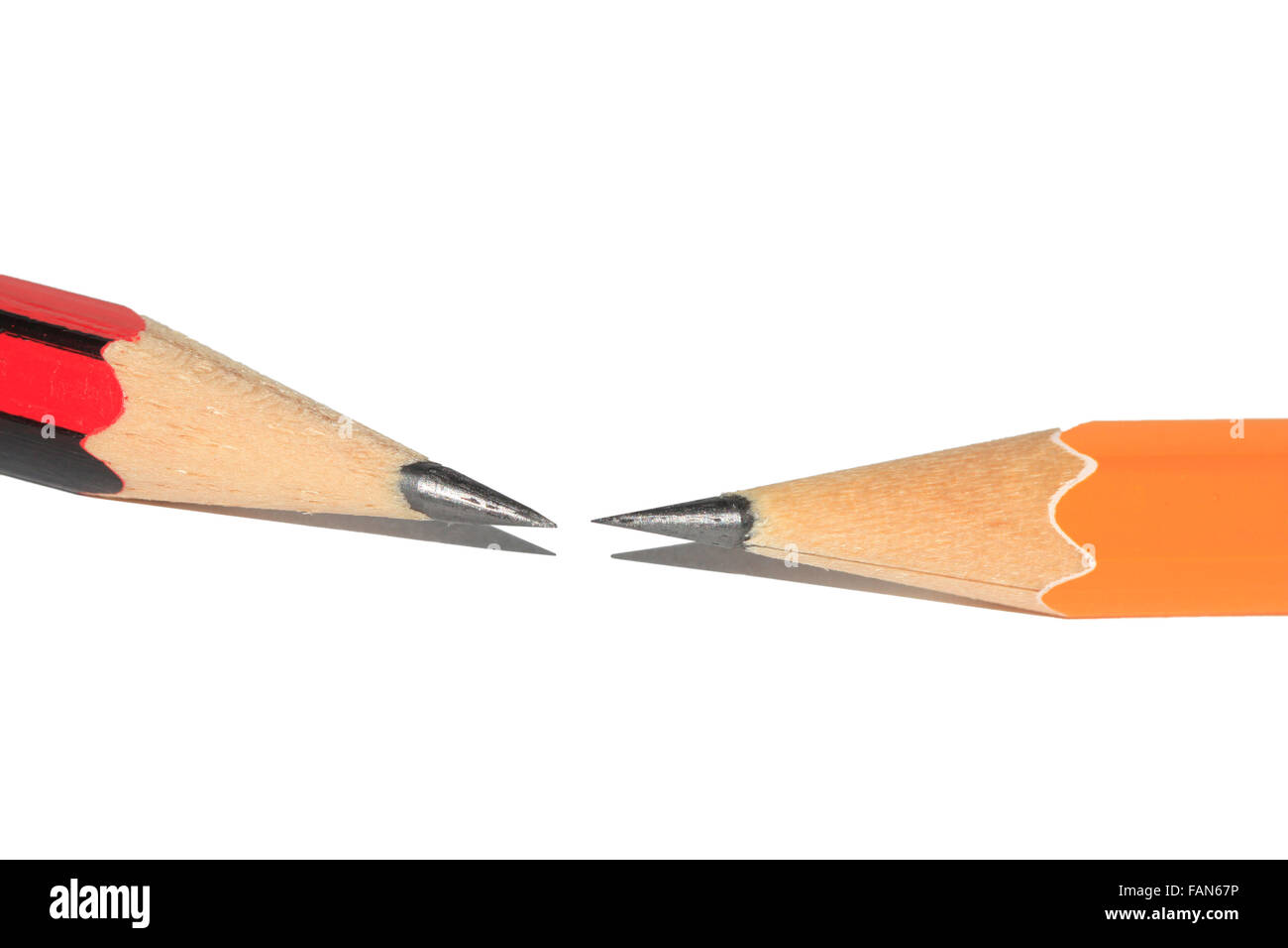 two sharp pencils on white background Stock Photo - Alamy