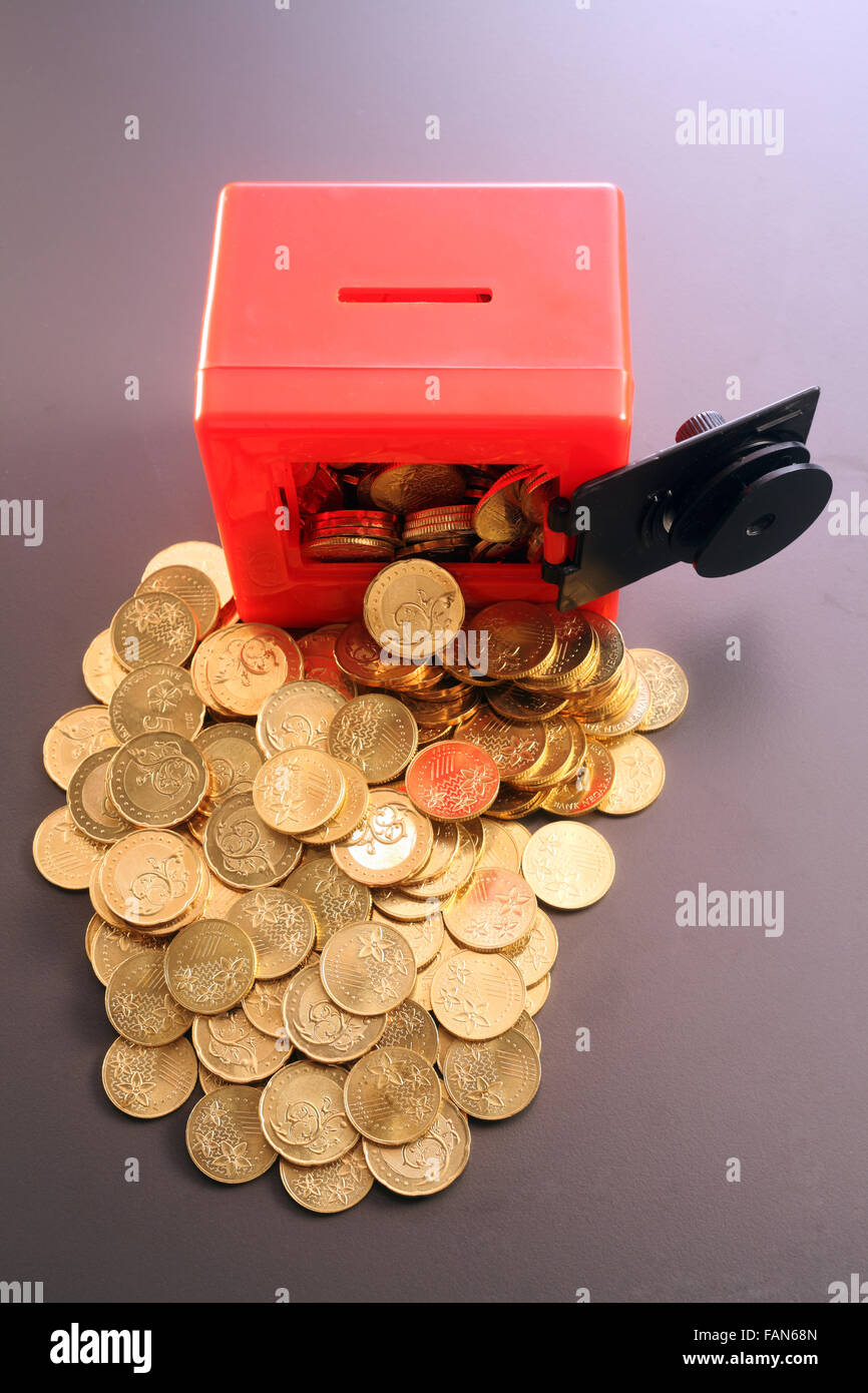 Toy Safe with Gold Coins Stock Photo - Alamy
