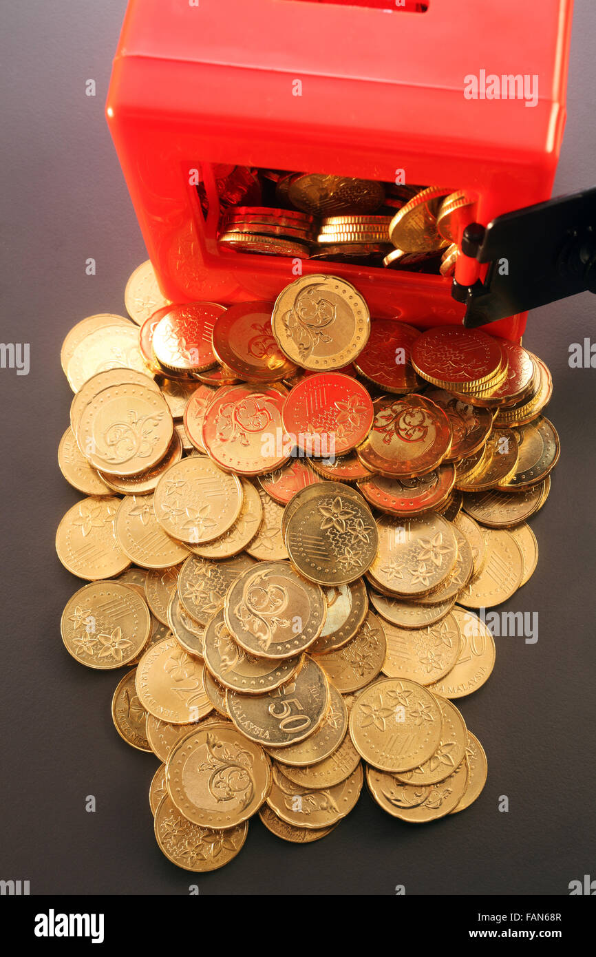 Toy Safe with Gold Coins Stock Photo - Alamy