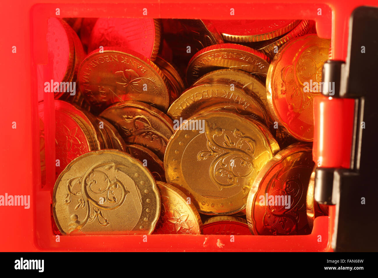 Toy Safe with Gold Coins Stock Photo - Alamy
