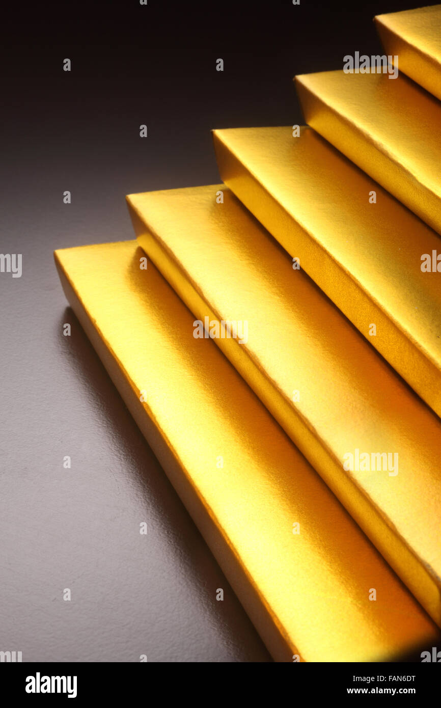 Gold bars stacked up Stock Photo - Alamy