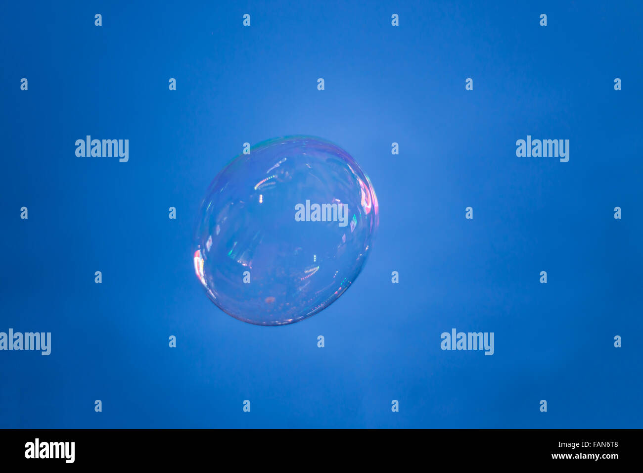 Soap bubble floating in the air with blue sky in the background Stock ...