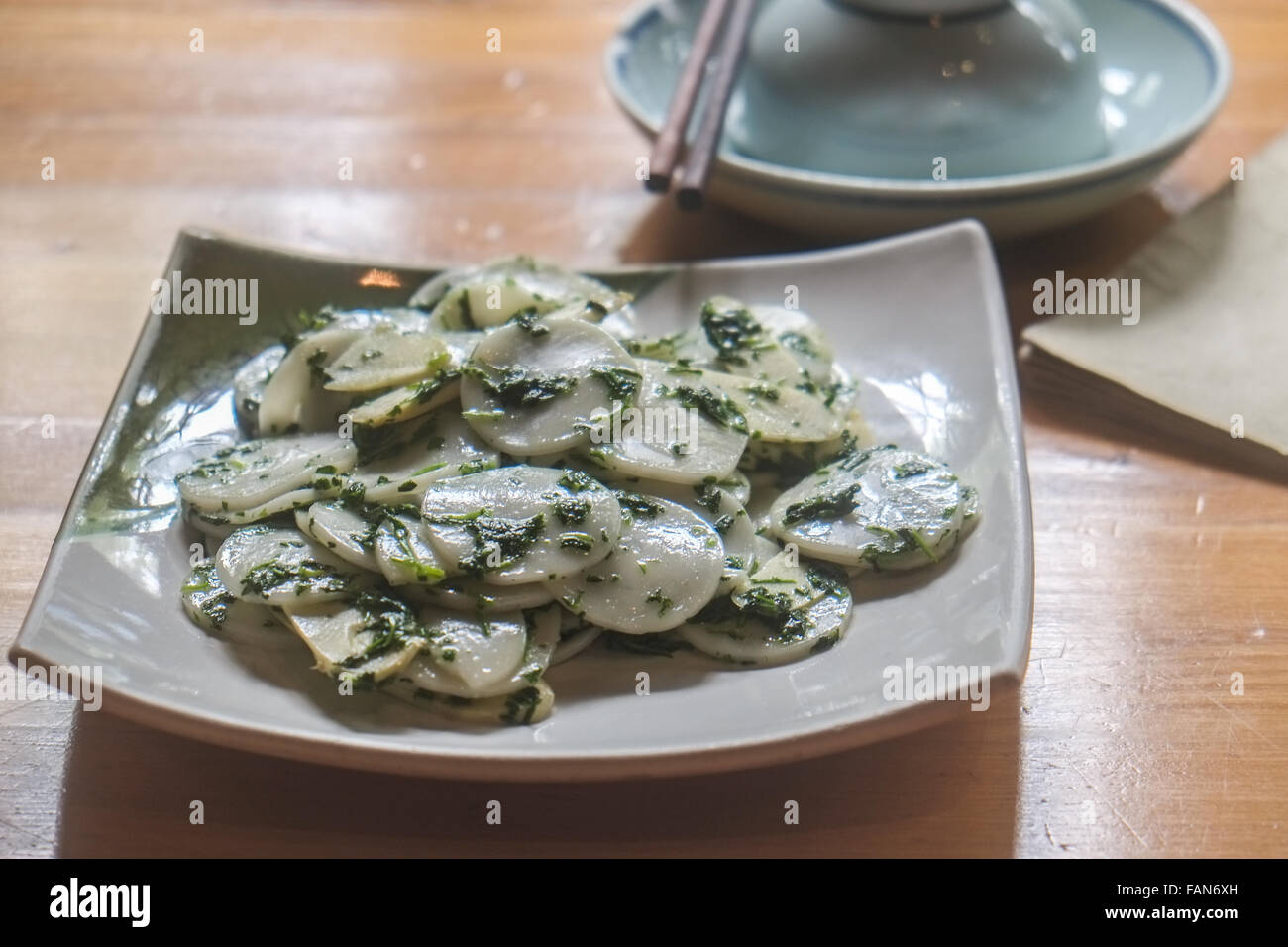 Plate on a table in a Chinese restaurant in China Stock Photo - Alamy