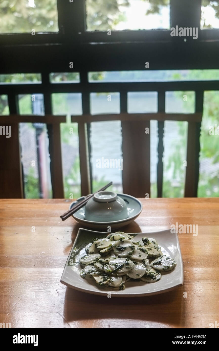 Plate on a table in a Chinese restaurant in China Stock Photo - Alamy