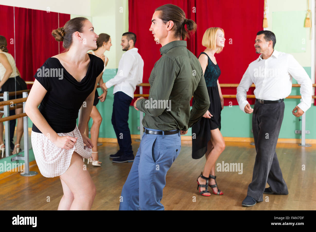 Energy young people dancing active dance in class Stock Photo - Alamy