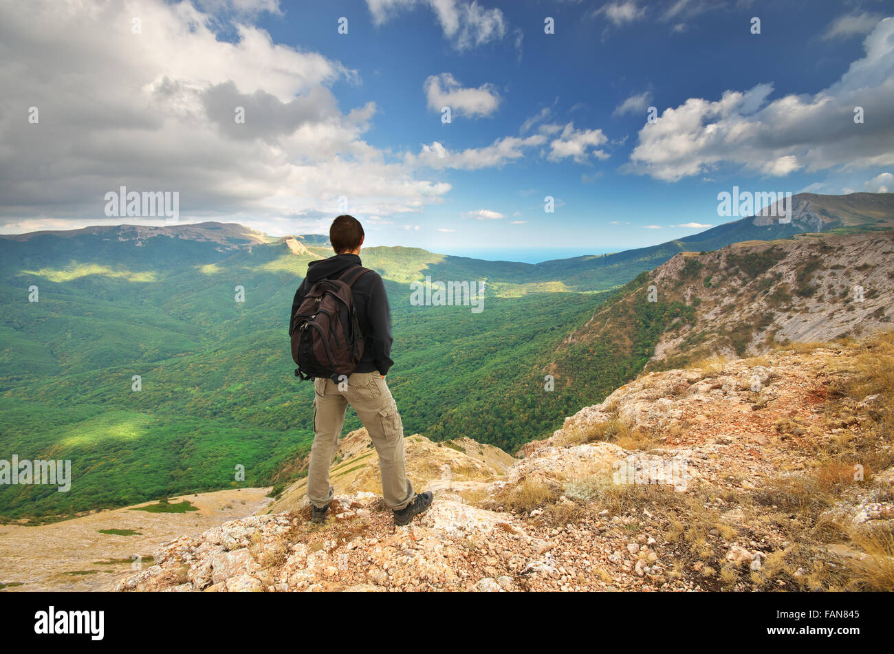 Man in mountain. Landscape composition Stock Photo - Alamy