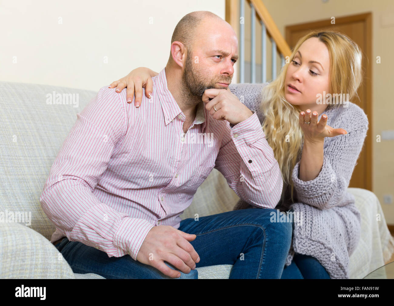 Man asking forgiveness from woman hi-res stock photography and images ...