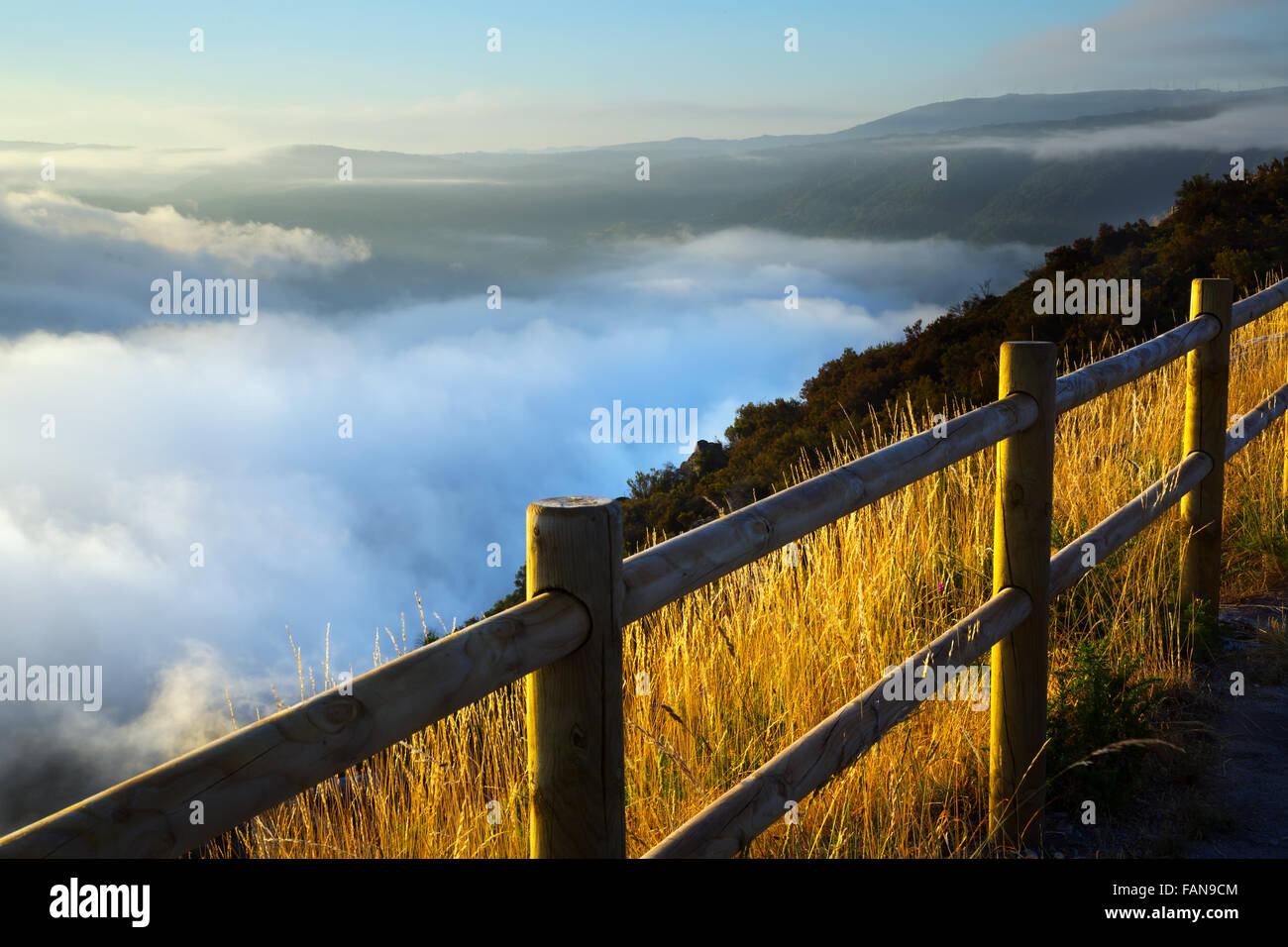 Fog over mountains in sunset galicia hi-res stock photography and ...
