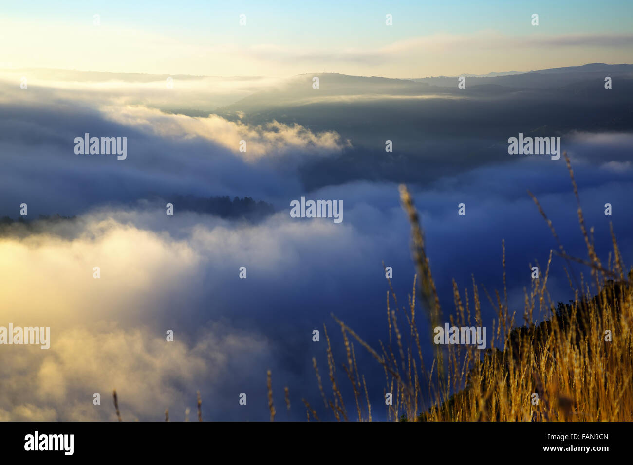 Fog over mountains in sunset galicia hi-res stock photography and ...