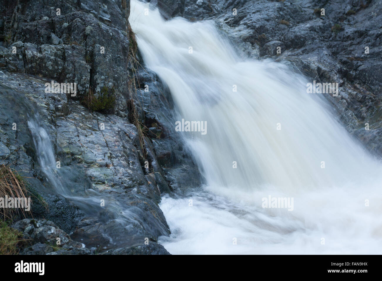 Water rushing over rocks Stock Photo - Alamy