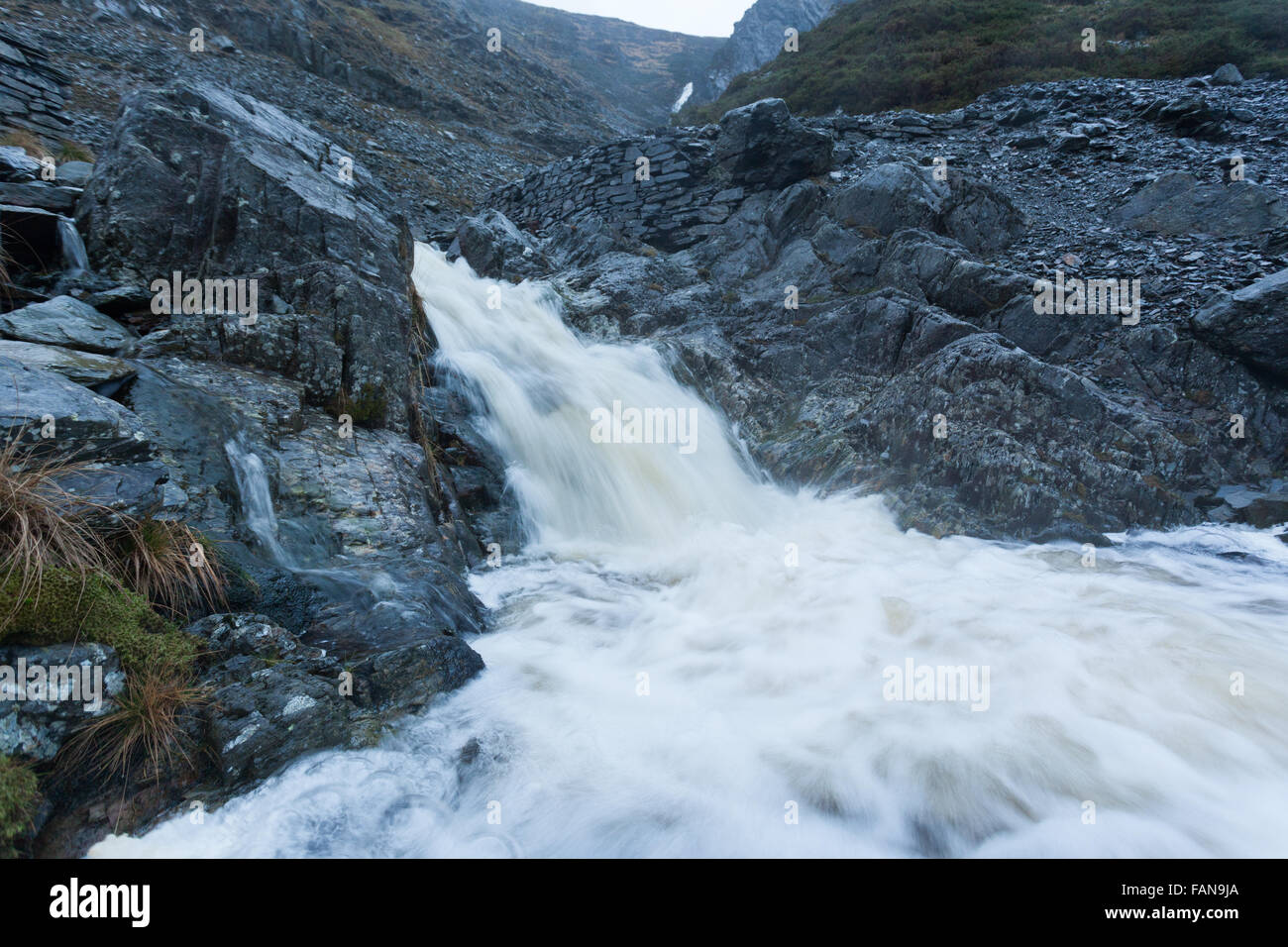 Water rushing over rocks Stock Photo - Alamy