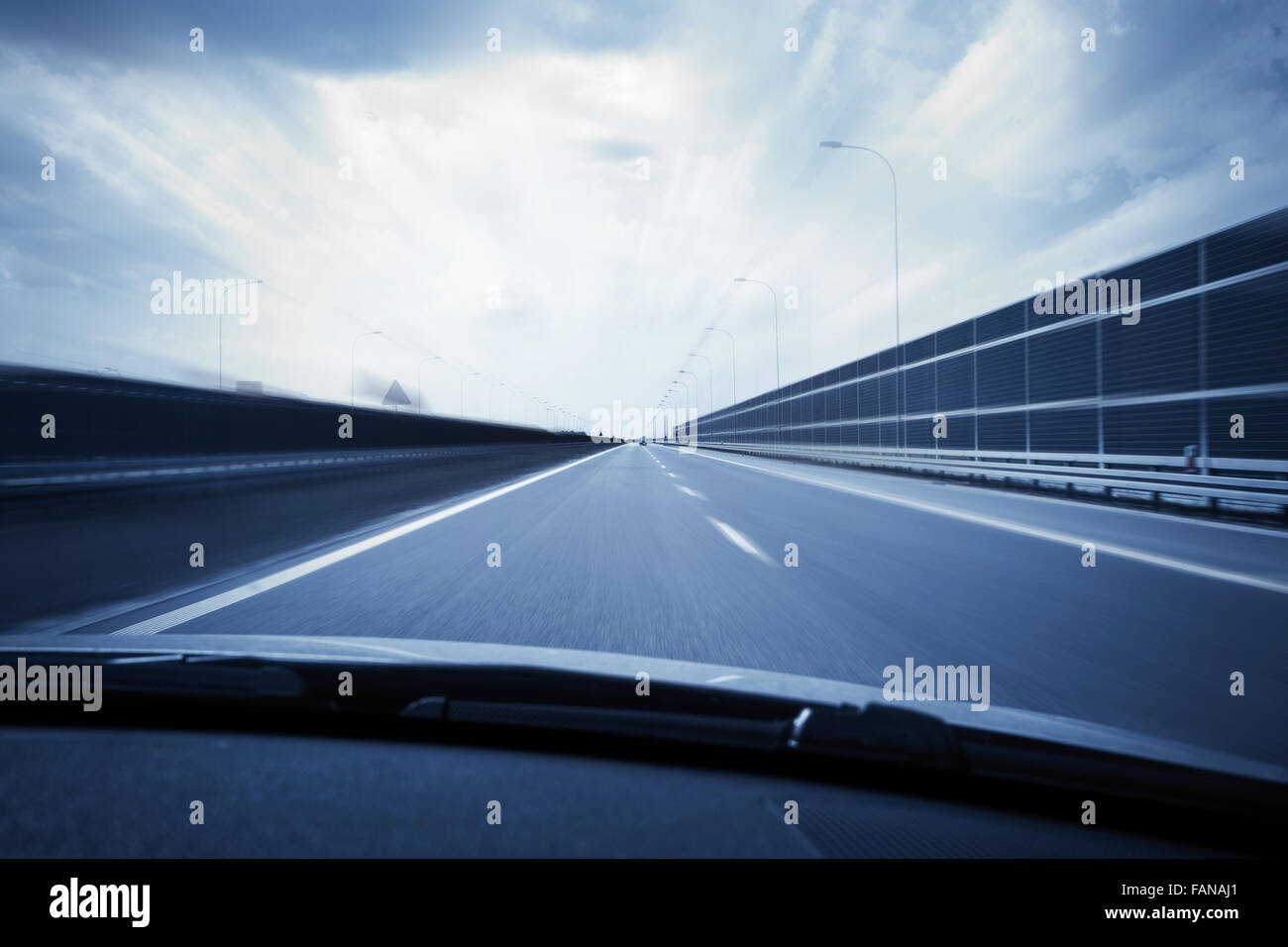 Car view with motion blur road background Stock Photo - Alamy