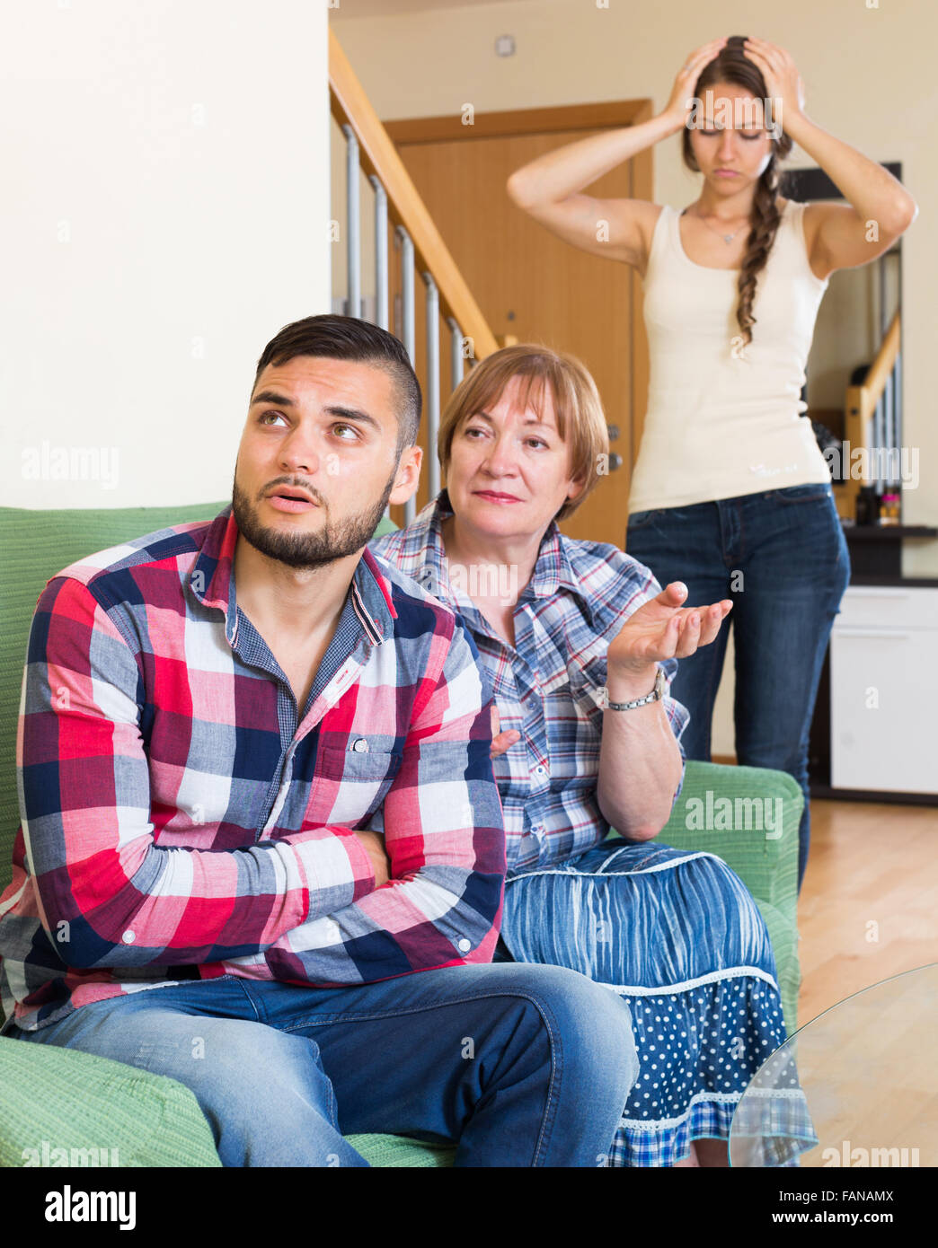 Man has a stressful conversation with his mother Stock Photo - Alamy