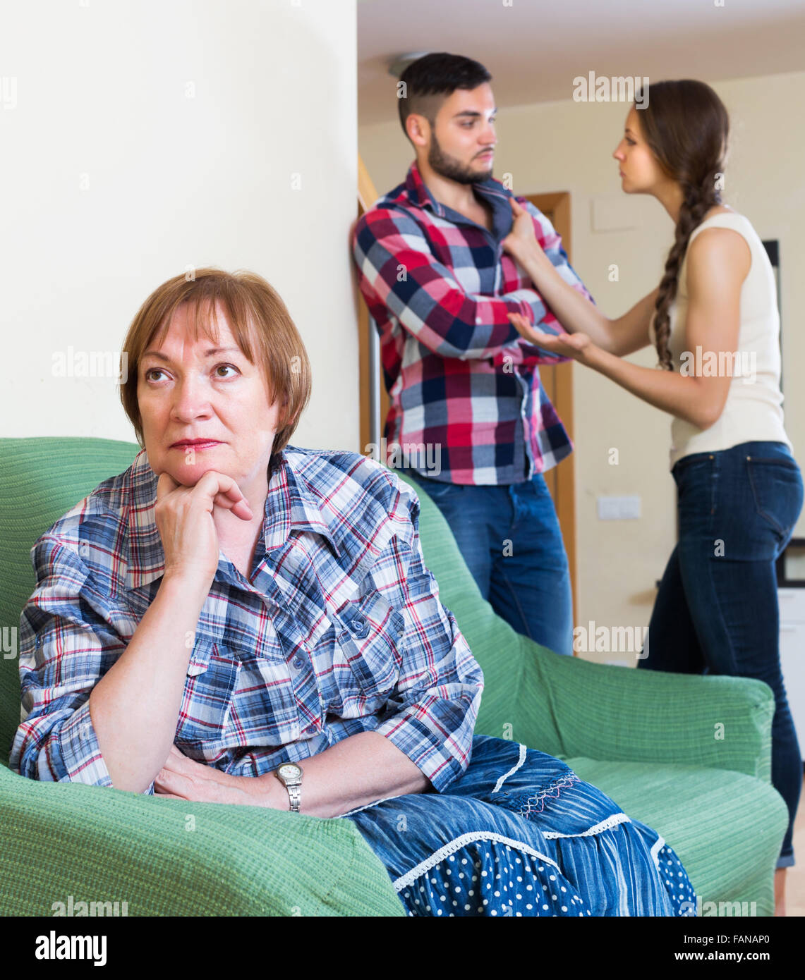 Unhappy mature mother having conflict with their upset children Stock ...