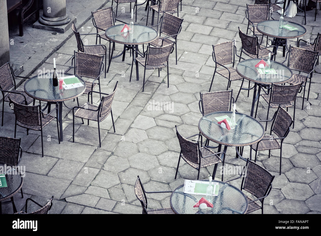 Street cafe terrace with tables and chairs in European city Stock Photo ...