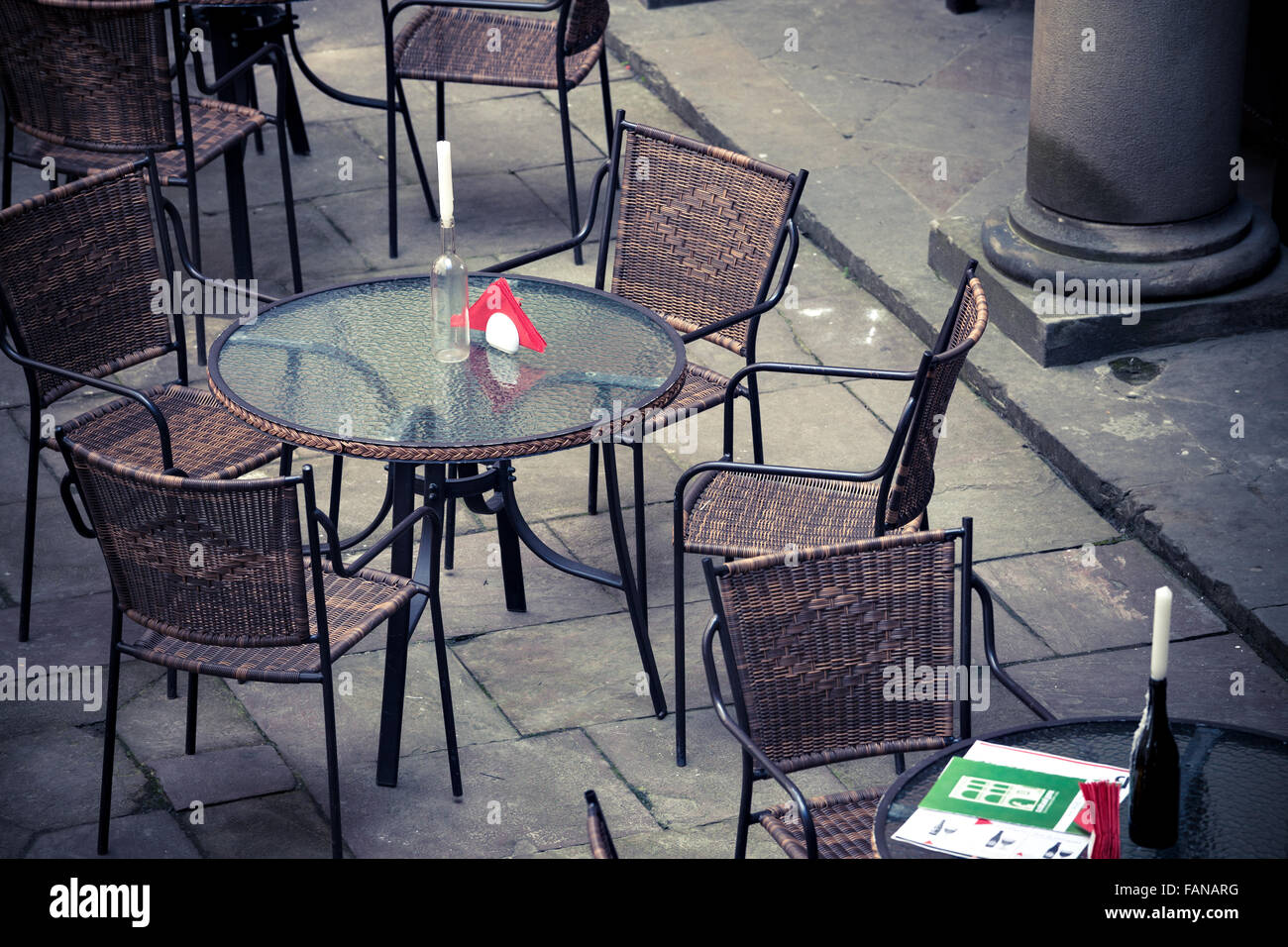 Street cafe terrace with table and chairs in European city Stock Photo ...