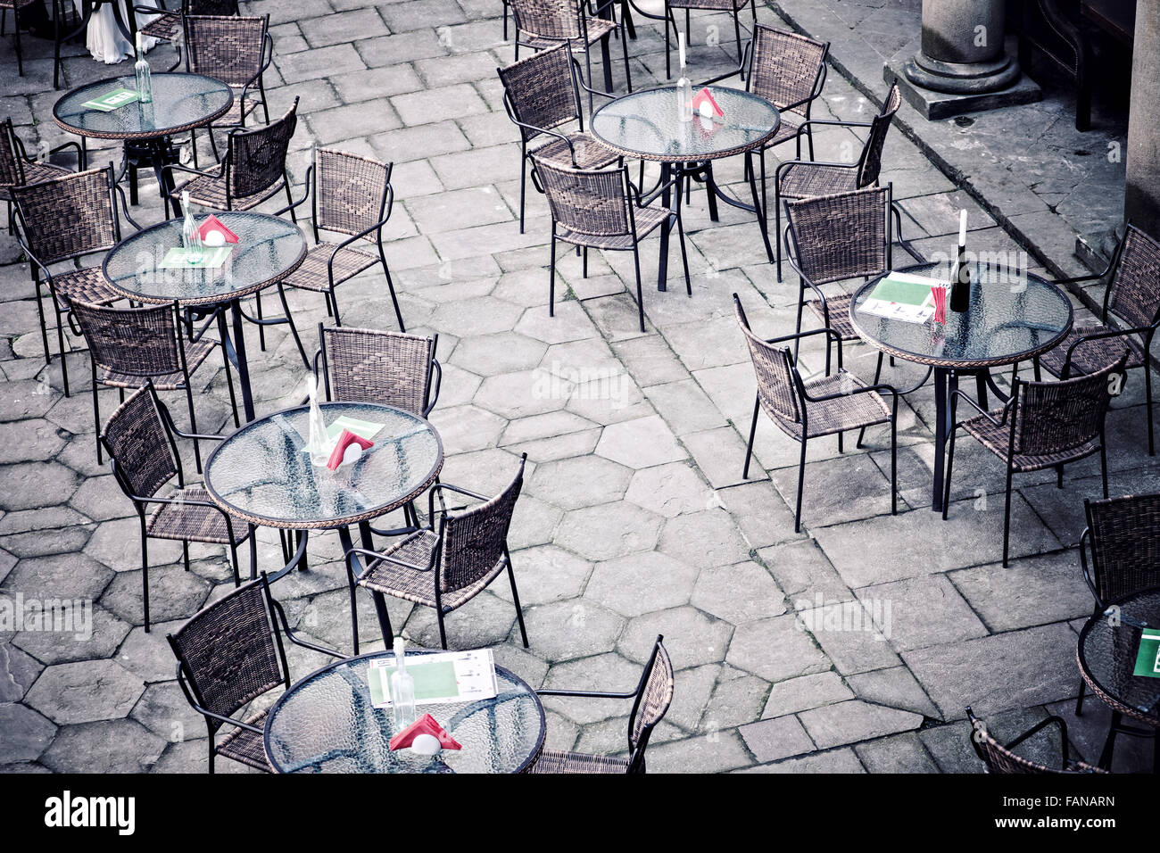 Street cafe terrace with tables and chairs in European city Stock Photo ...