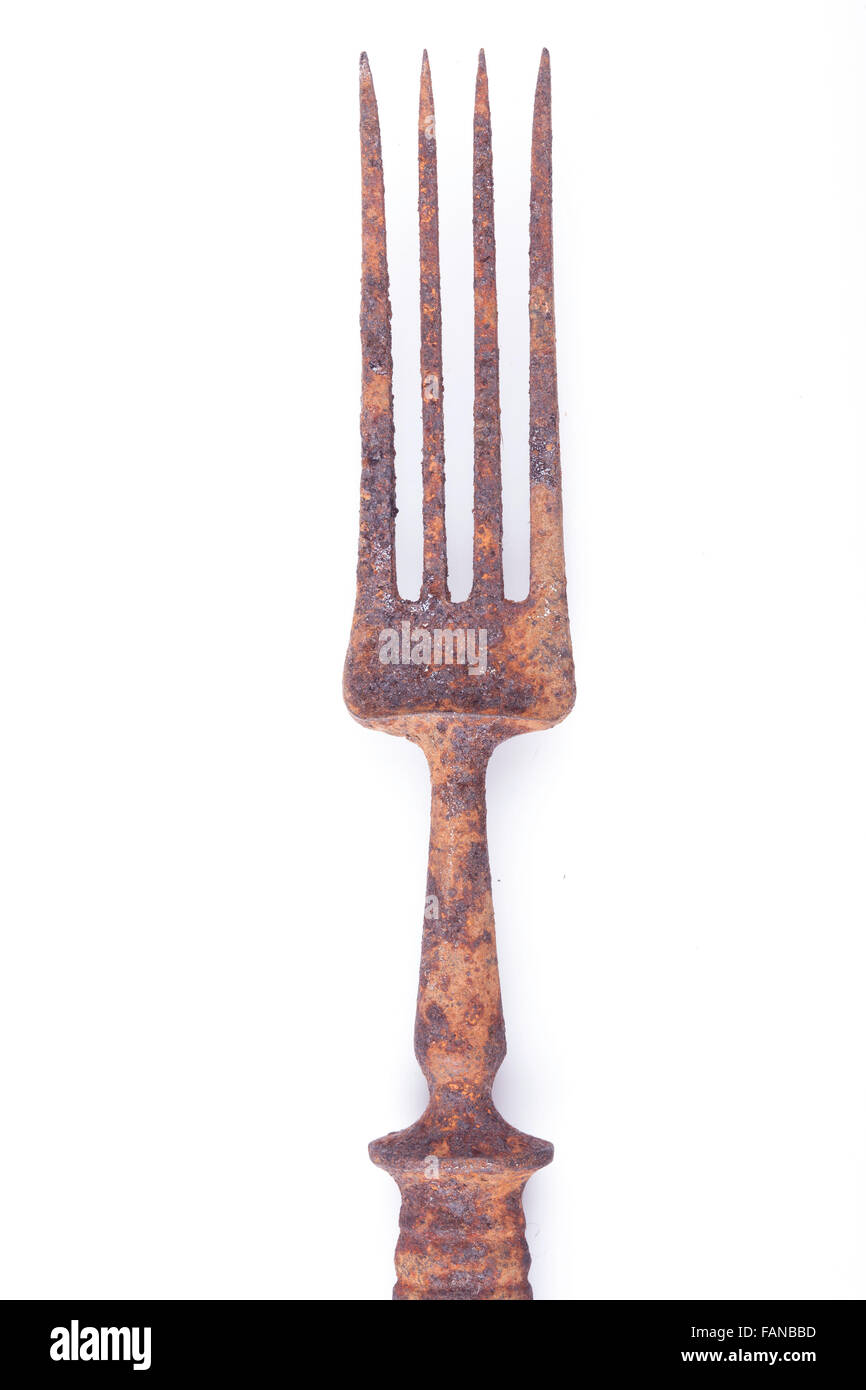 old rusty fork on a white background Stock Photo - Alamy