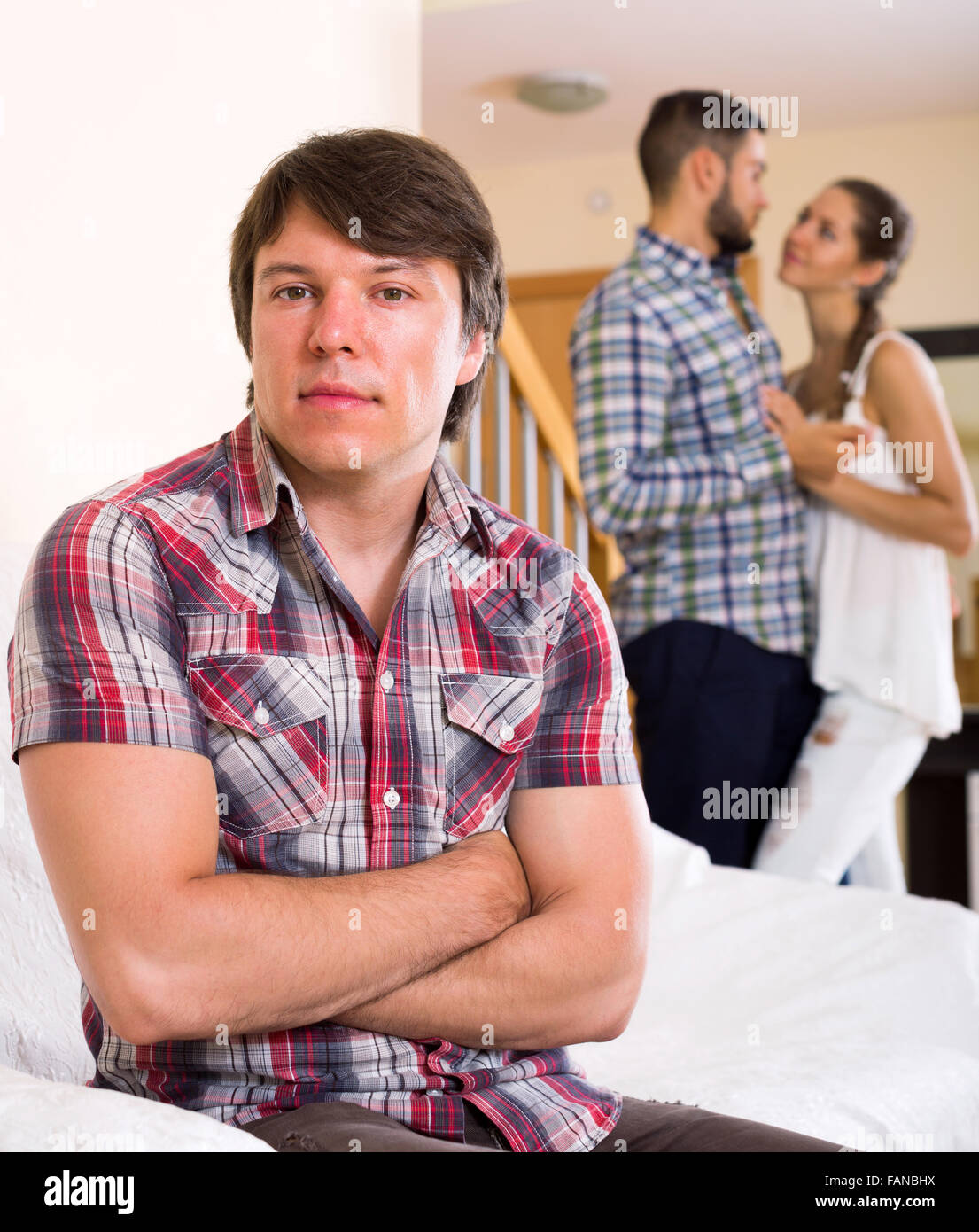 Quarrel among young partners at home interior Stock Photo - Alamy