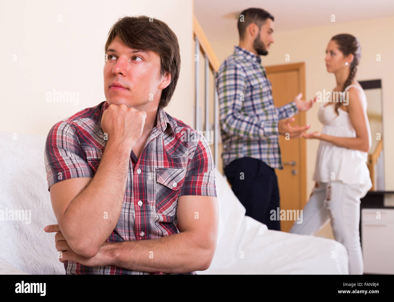 Unhappy adults having troubles argue at home interior Stock Photo - Alamy