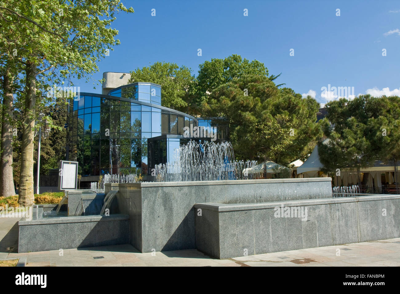 Fountain and modern building on sea quay of town Yalta, famous resort ...