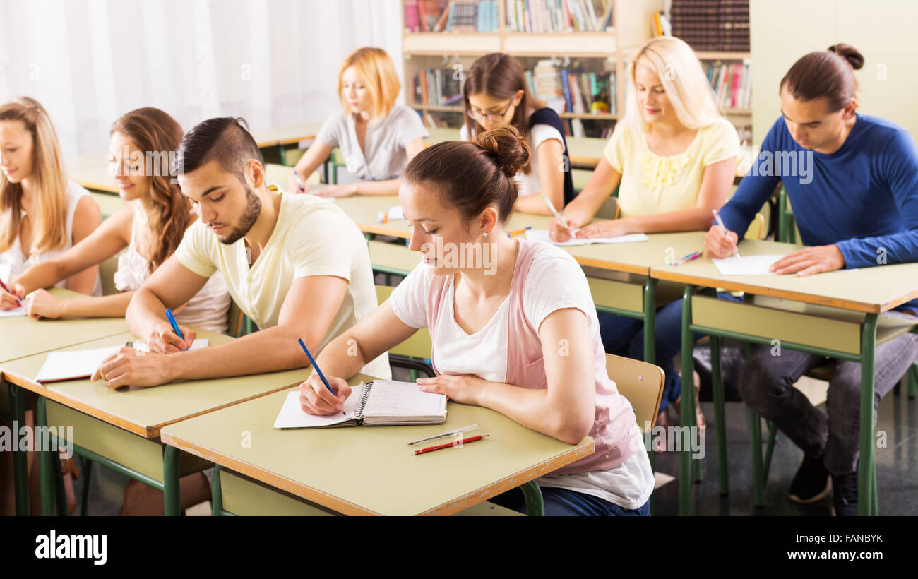 Young beautiful students studying in the classroom Stock Photo - Alamy