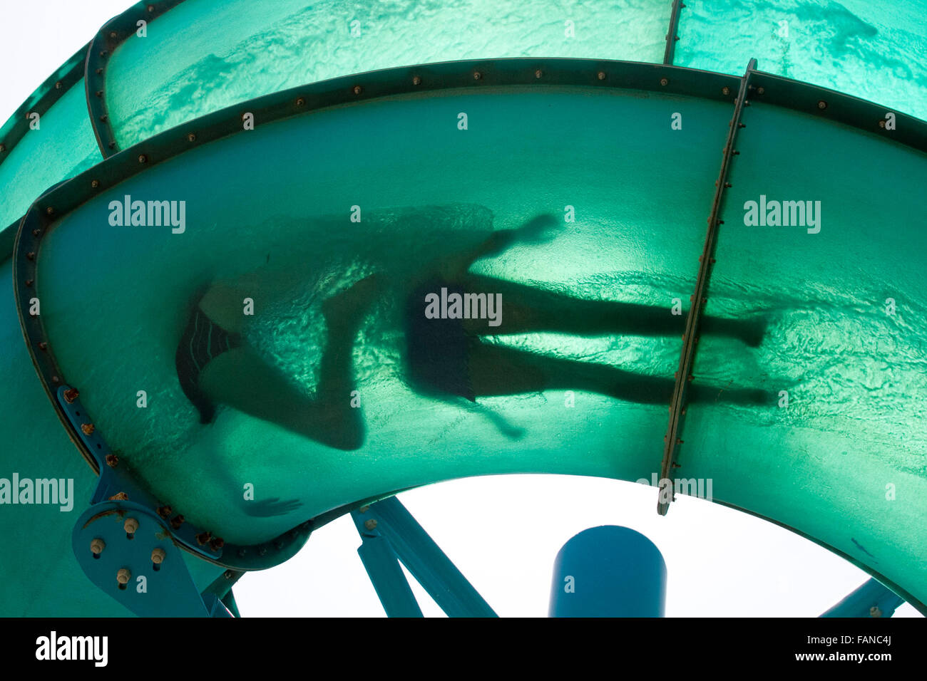 People going down a slide hi-res stock photography and images - Alamy