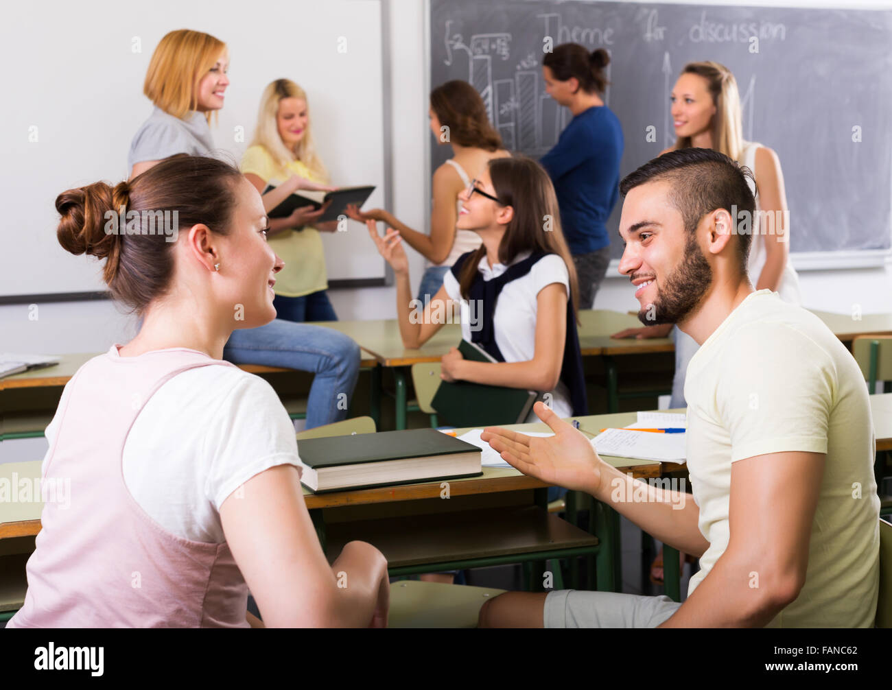 Several positive students communication sitting in the classroom Stock ...