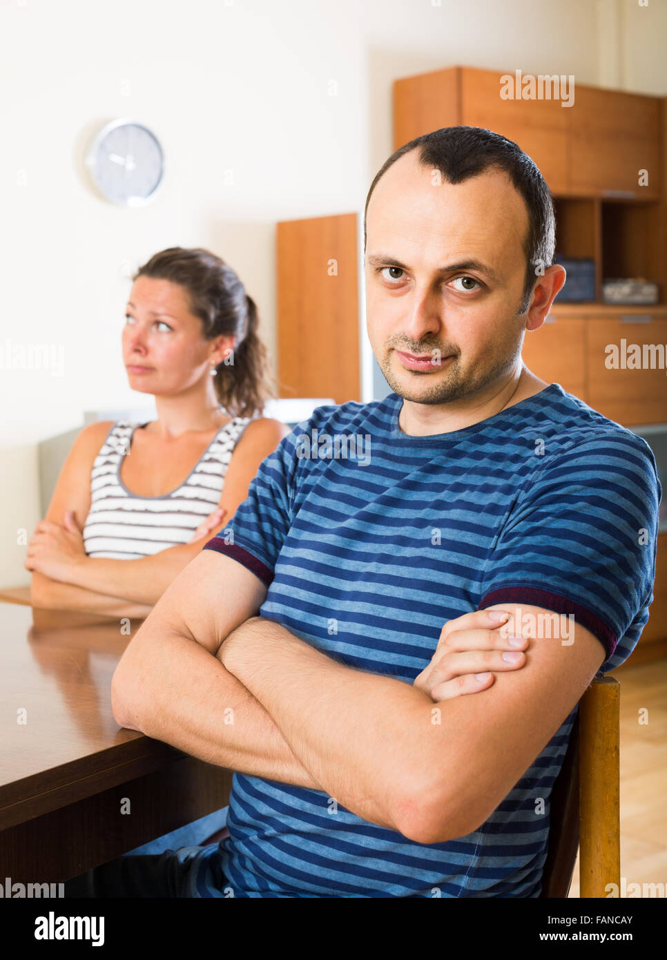 sad american family couple shouting while arguing indoors Stock Photo ...