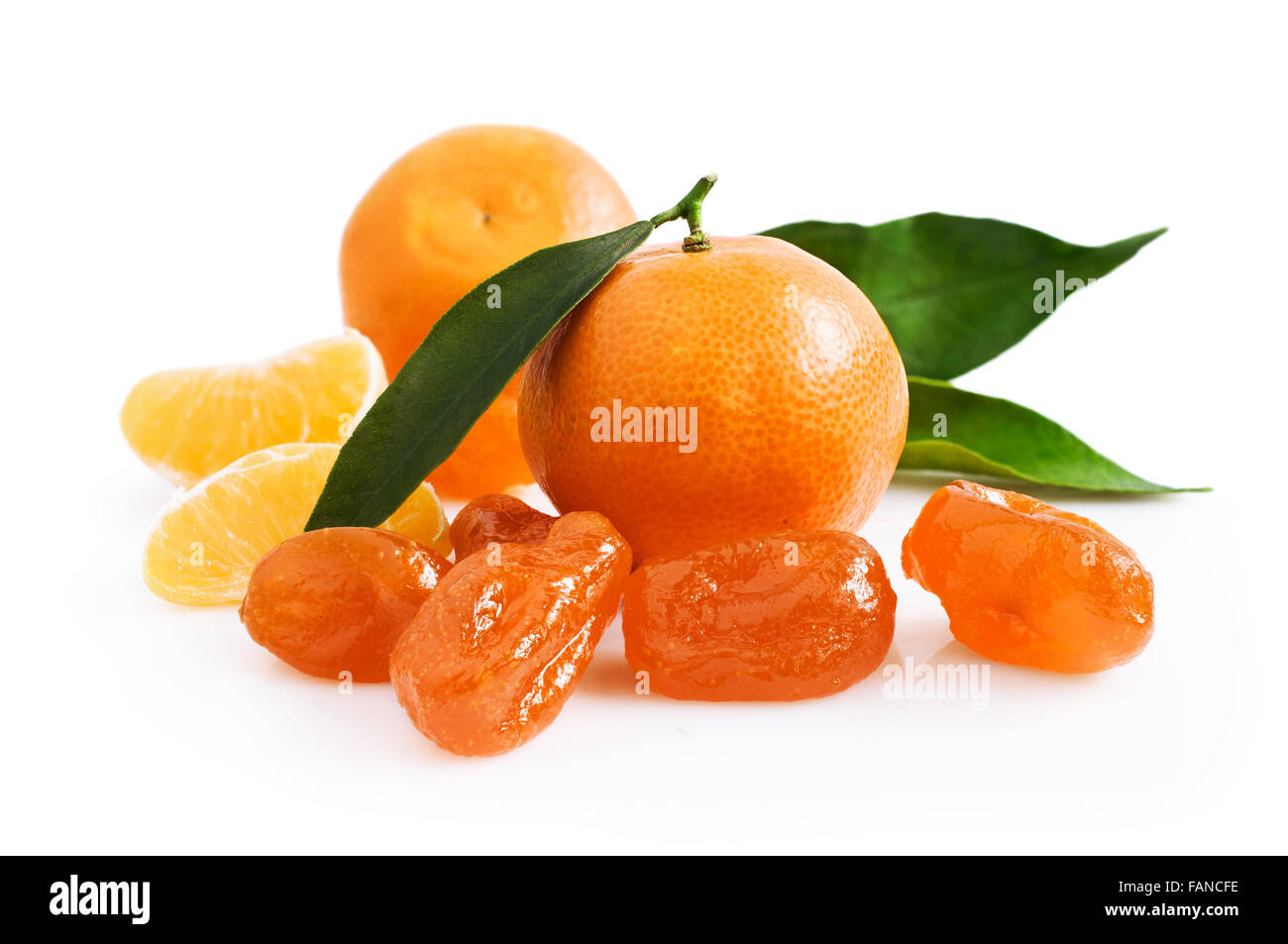 Mandarin and candied fruits isolated on white background Stock Photo ...