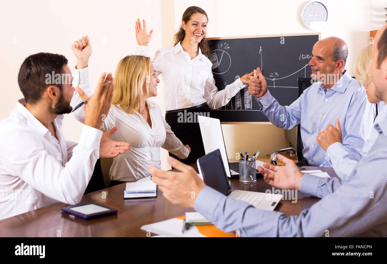 successful female expert makes a presentation at a meeting in the ...
