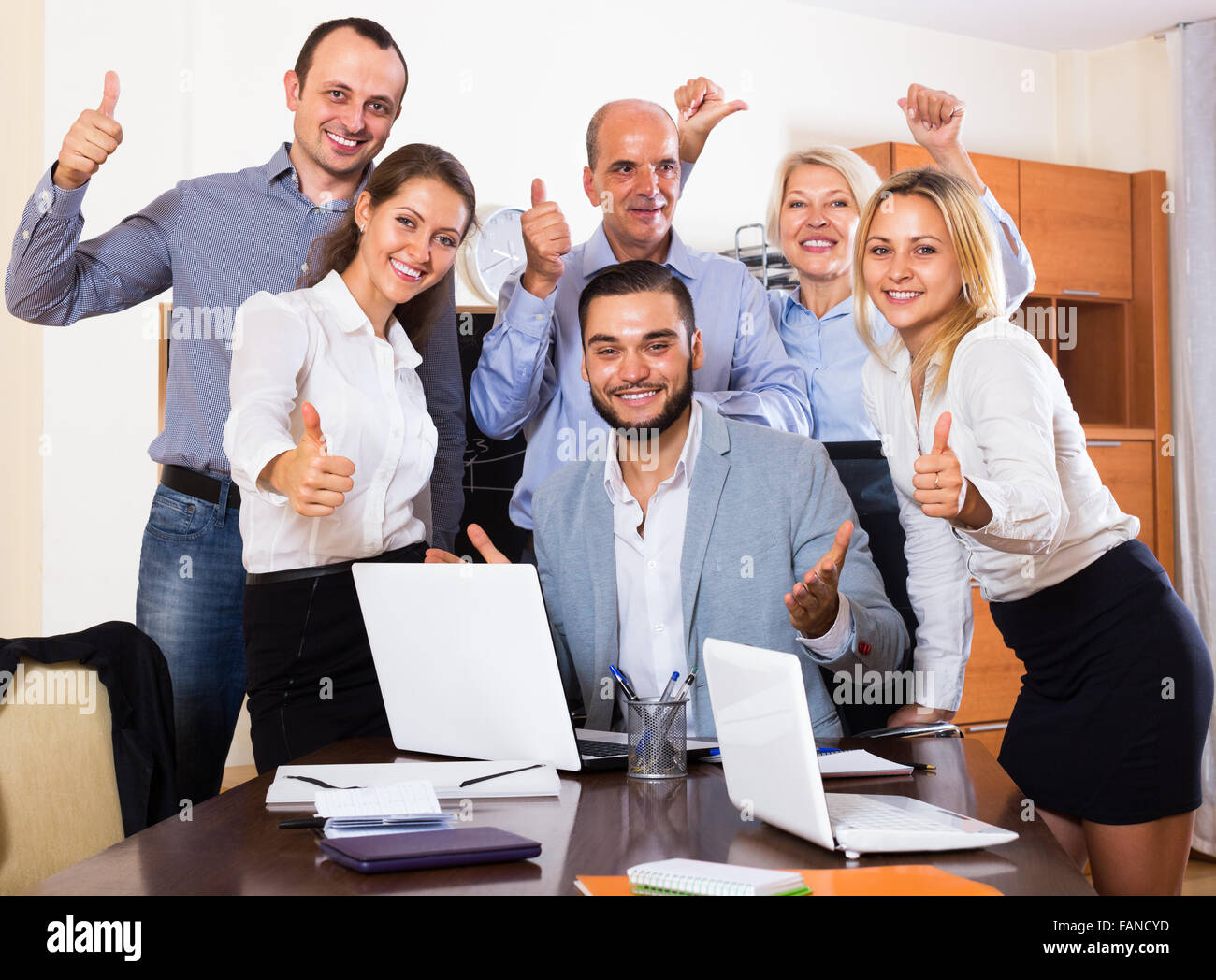 Successful business people having break together at the office Stock ...
