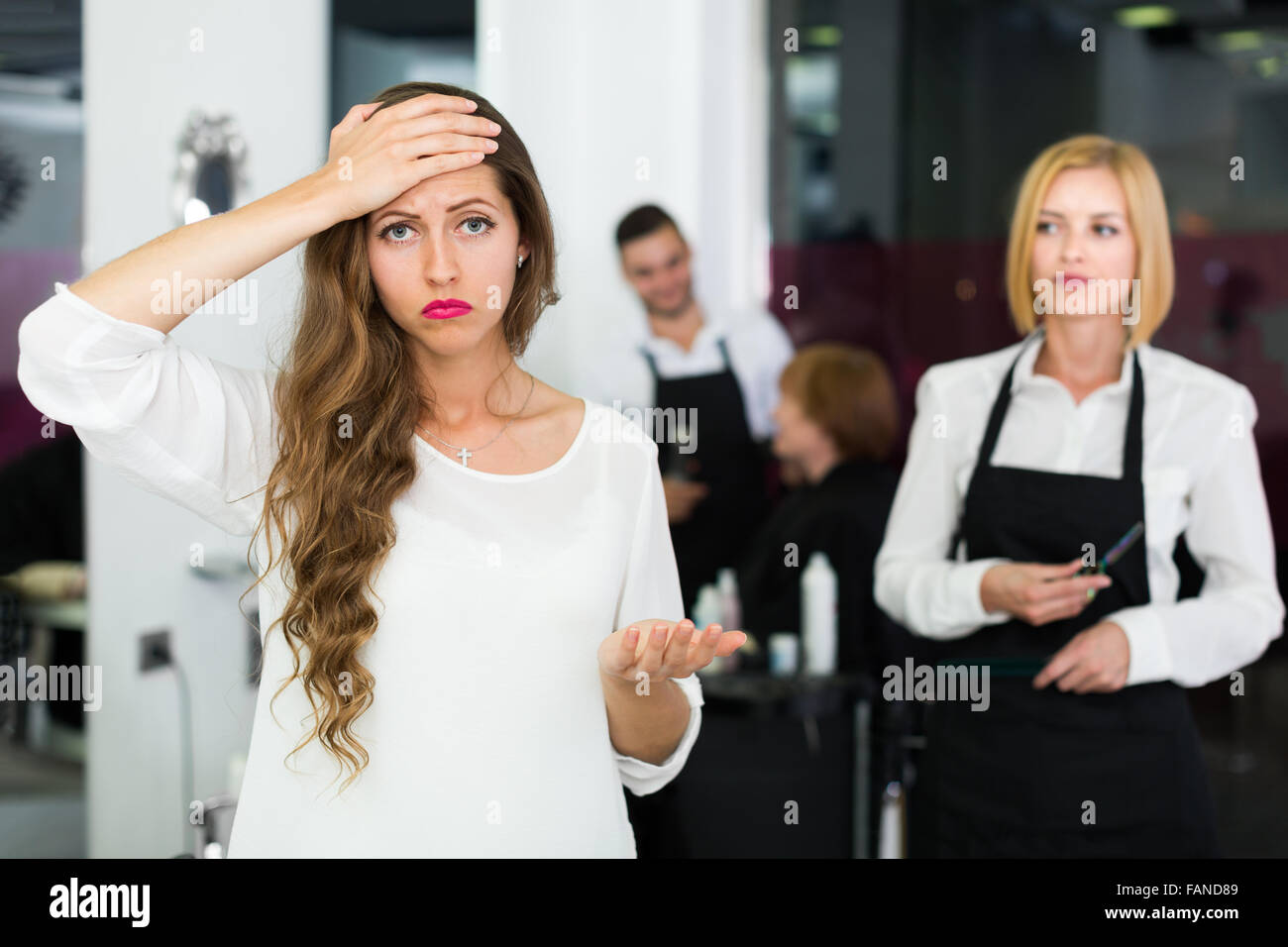 Woman hairdresser sad hi-res stock photography and images - Alamy