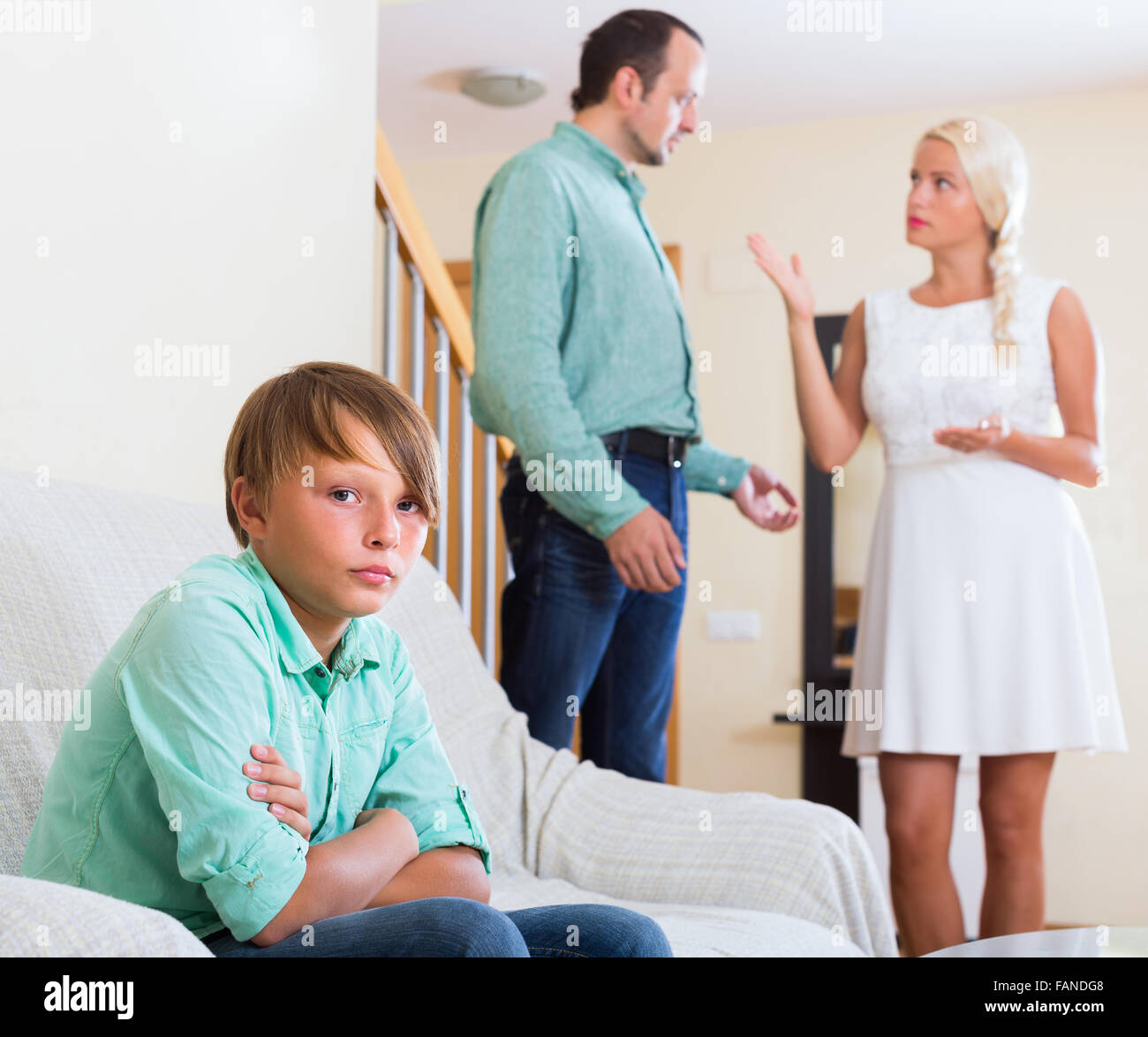 Son teenager suffering of parents argue at home Stock Photo - Alamy