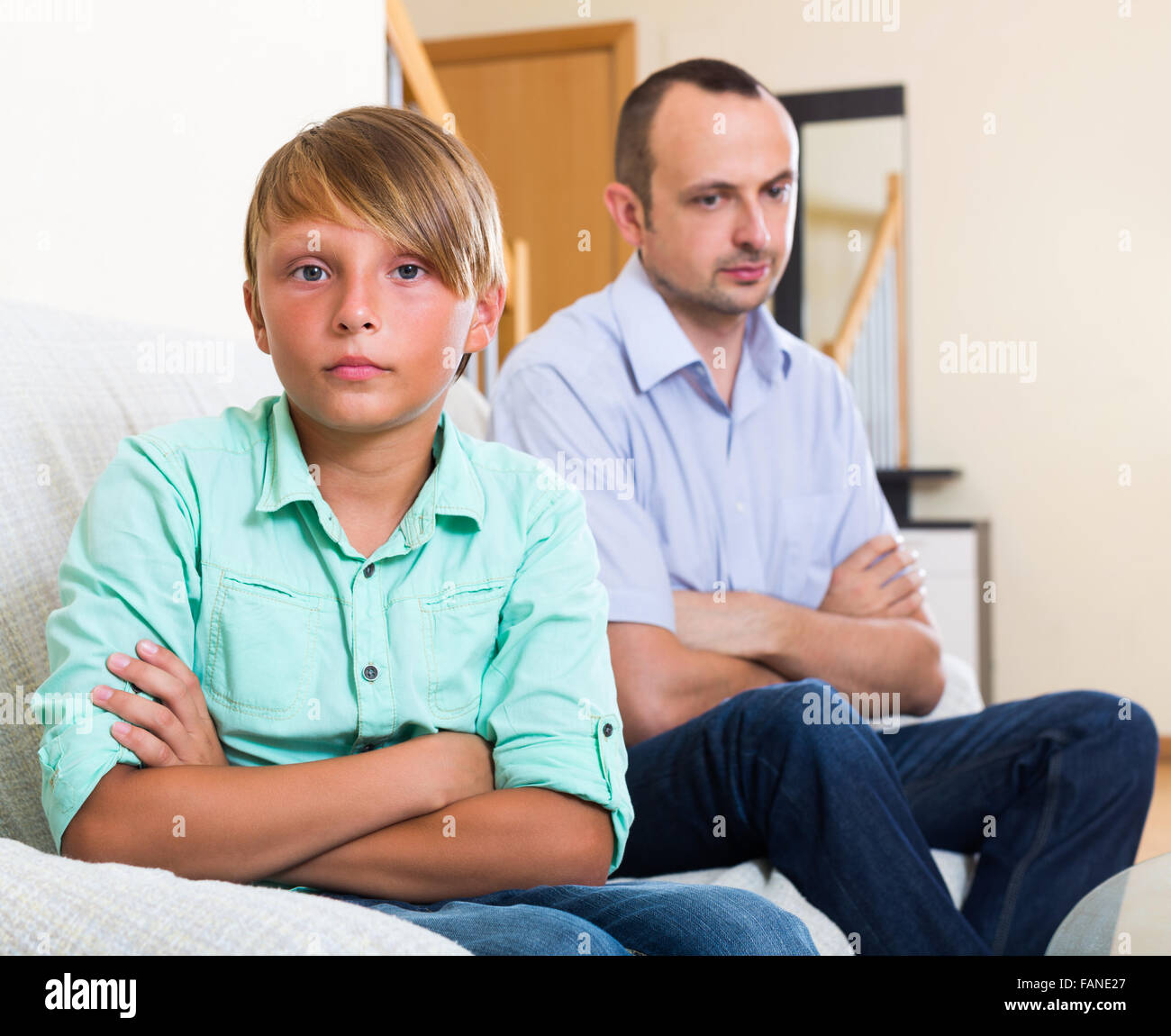 Troubled relations of arguing dad and son - domestic quarrel Stock ...