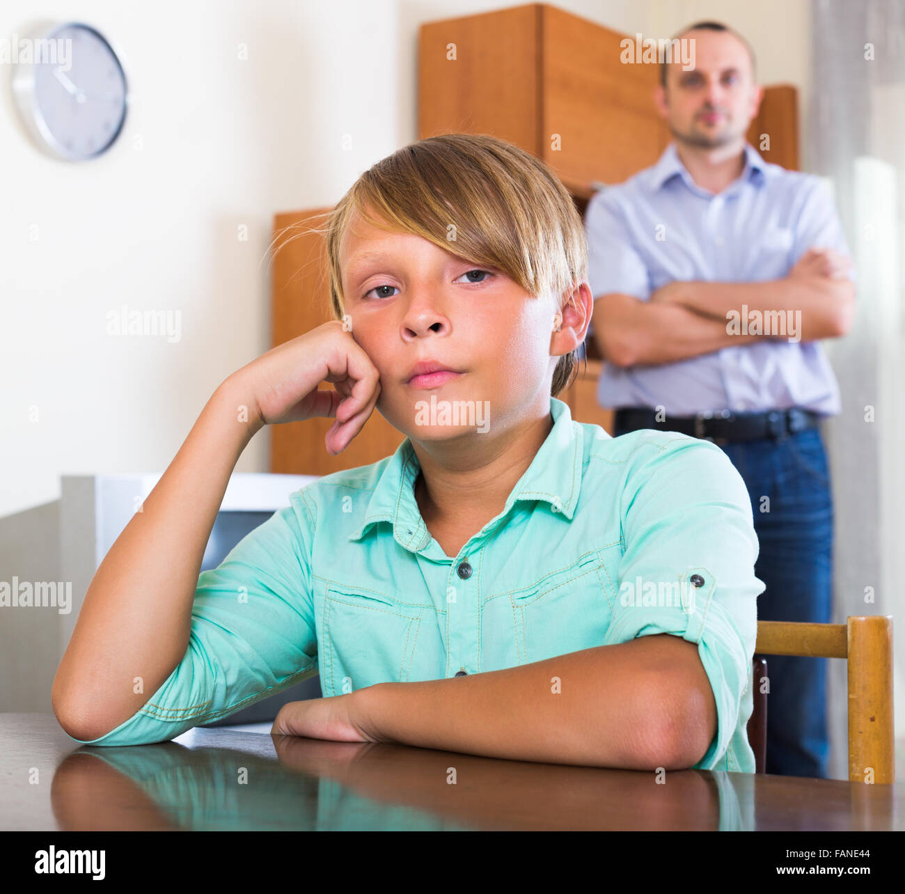 Unhappy son having conflict with dad - domestic quarrel Stock Photo - Alamy