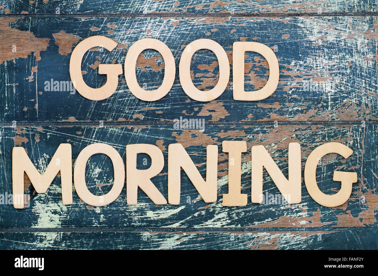 Good morning written with wooden letters on rustic surface Stock Photo ...