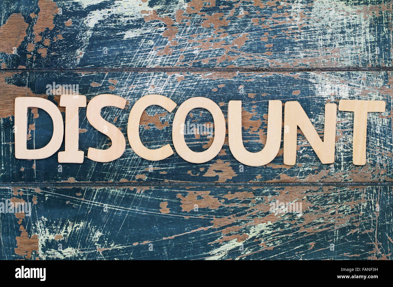 Word discount written with wooden letters on rustic surface Stock Photo ...