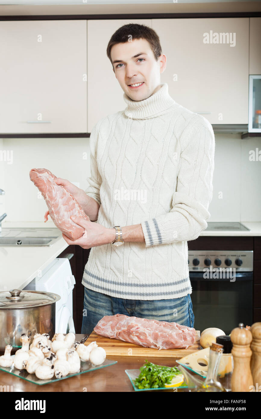man cooking Veal Prince Orloff at kitchen Stock Photo - Alamy