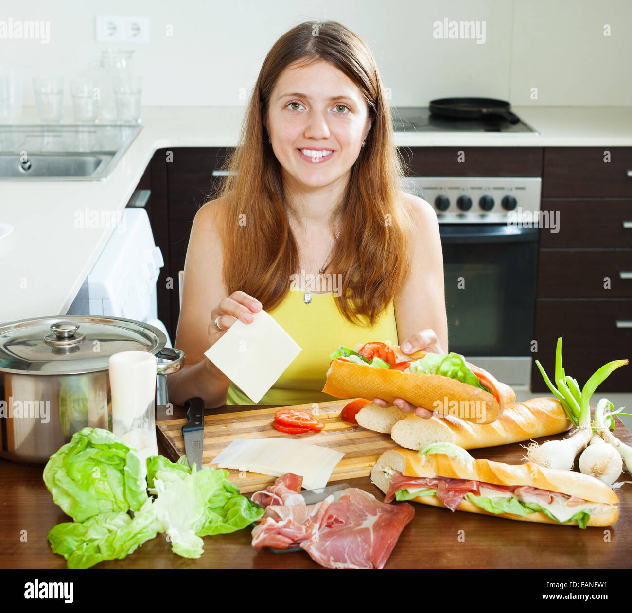 Happy girl cooking spanish hi-res stock photography and images - Alamy