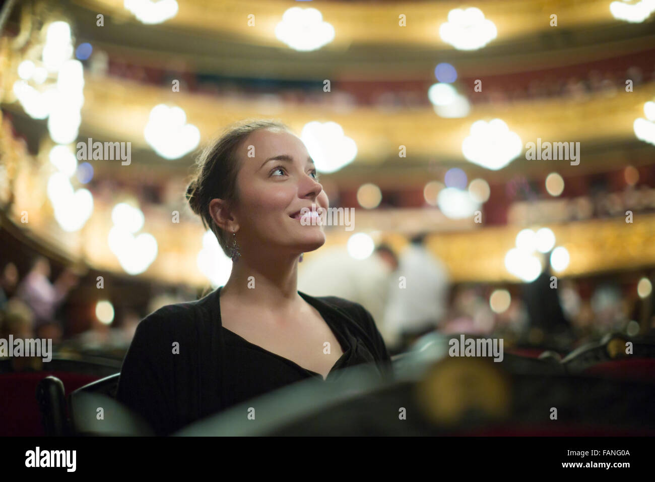 Portrait of smiling girl in auditorium of opera teatre Stock Photo - Alamy