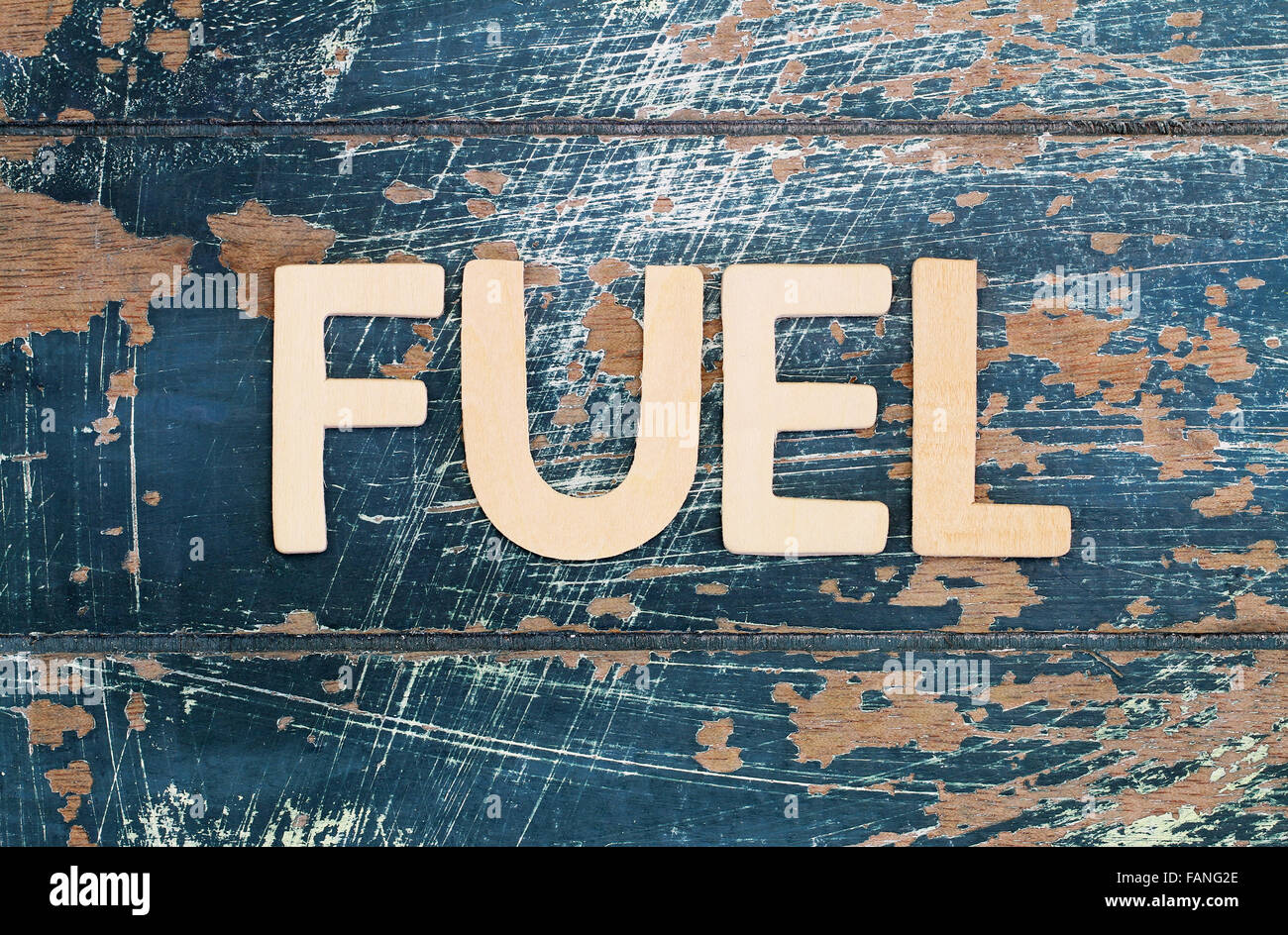 Word fuel written with wooden letters on rustic surface Stock Photo - Alamy