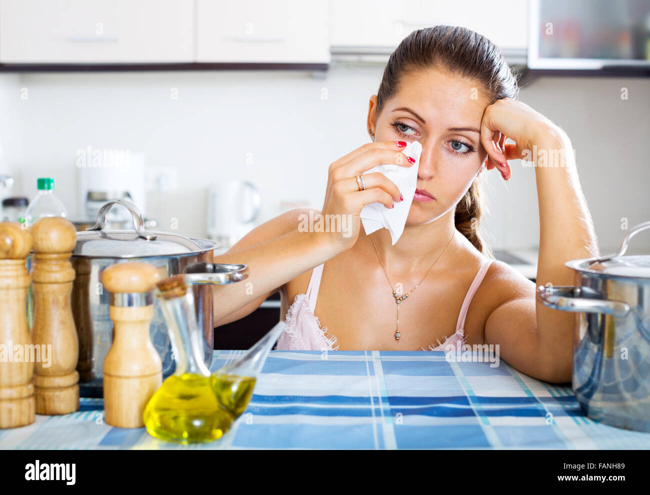 Portrait of depressed woman feeling blue indoors Stock Photo - Alamy