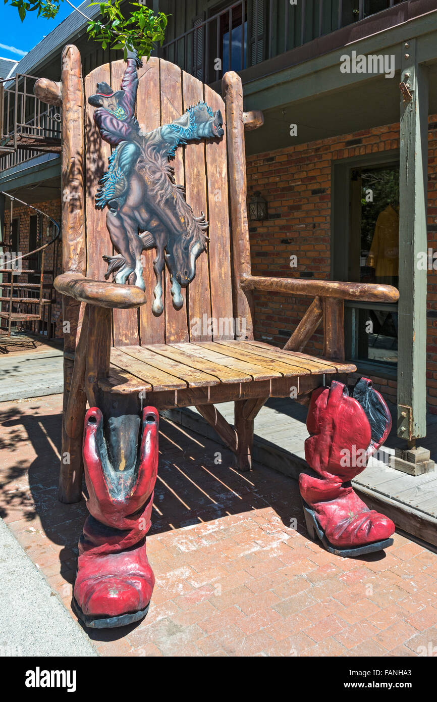 Idaho, Ketchum, cowboy chair wood carving Stock Photo - Alamy