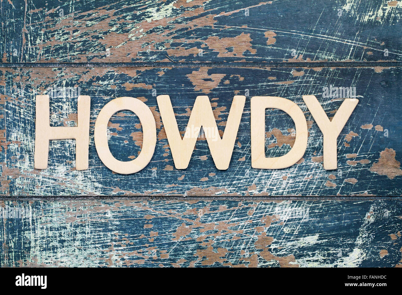 Word howdy written with wooden letters on rustic surface Stock Photo ...