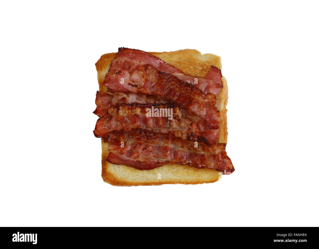Crispy bacon on toast isolated on white Stock Photo - Alamy