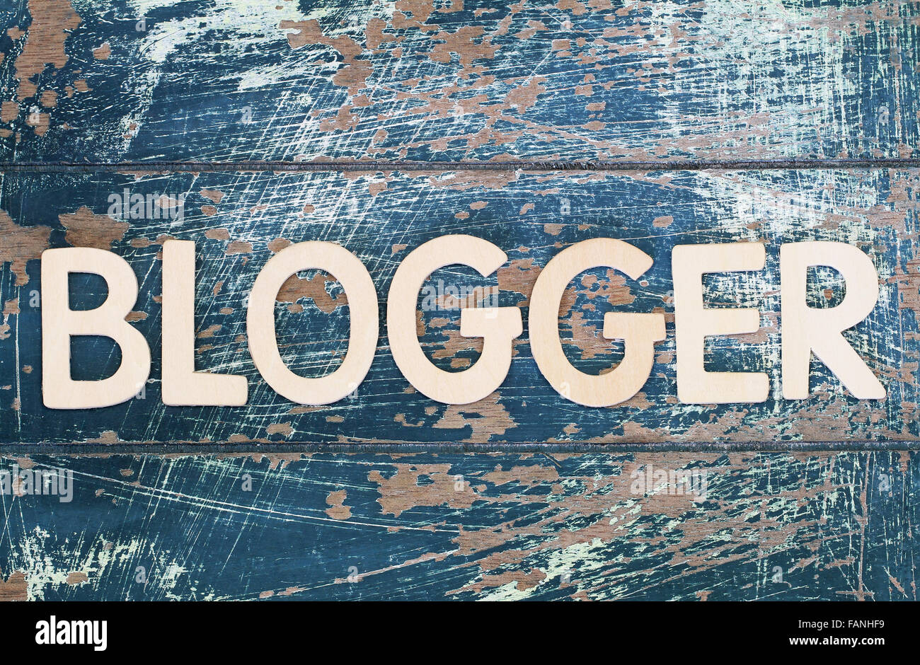 Word blogger written with wooden letters on rustic surface Stock Photo ...