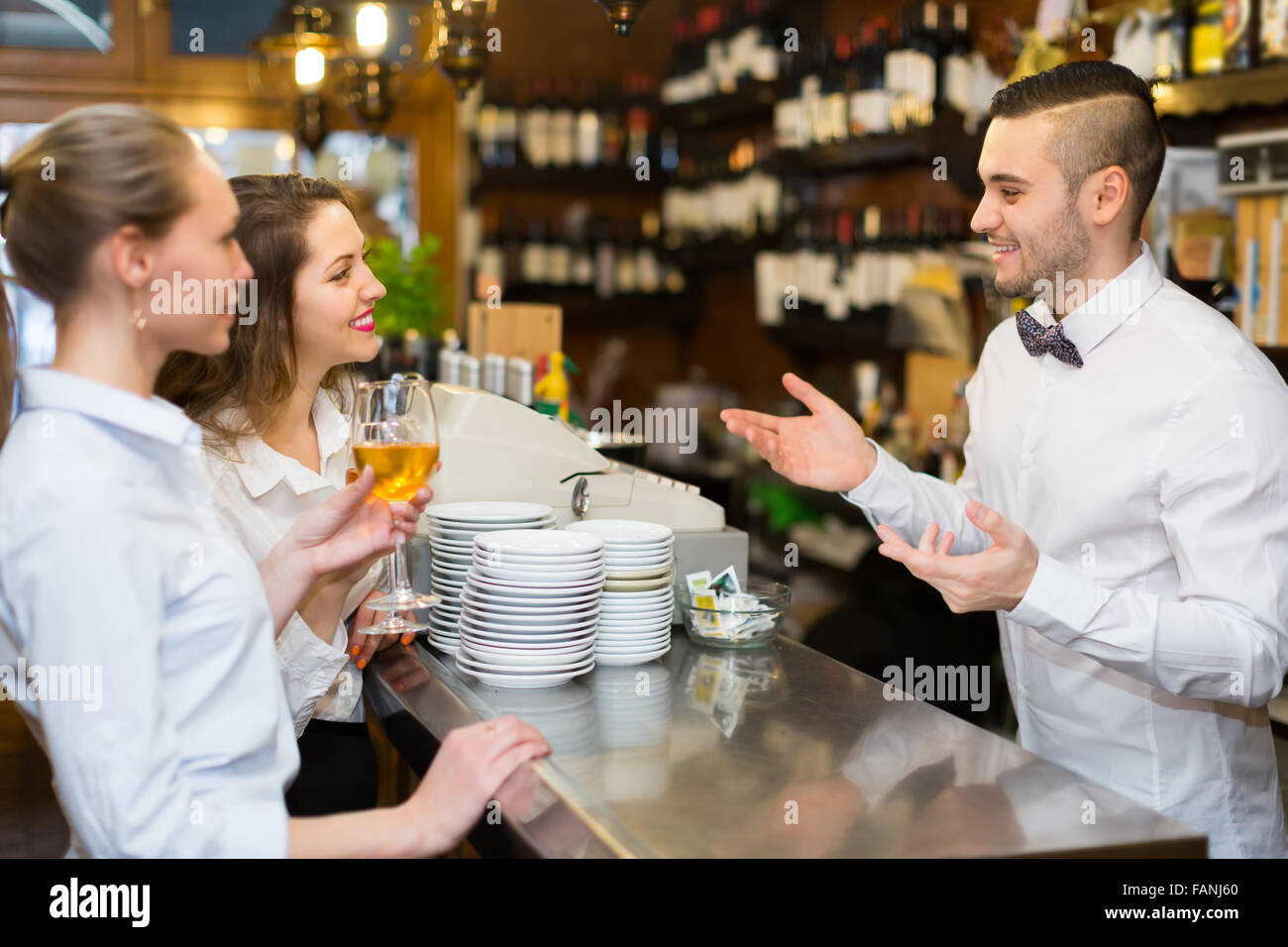 Two happy girls waiter in hi-res stock photography and images - Alamy