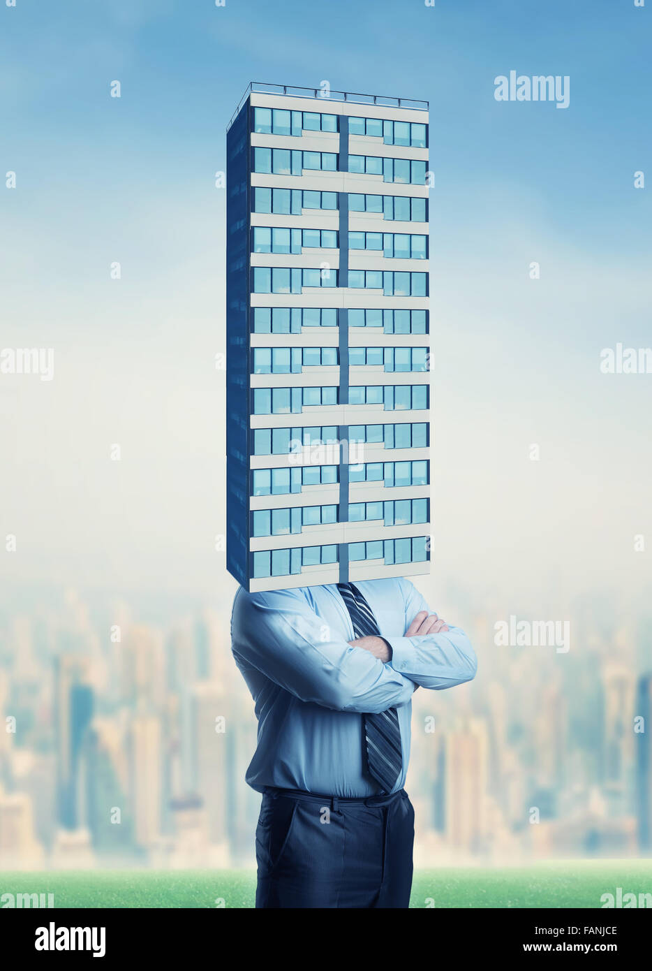 Businessman with building head Stock Photo - Alamy