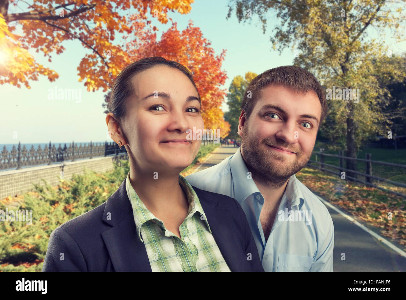 Man and woman smiling Stock Photo - Alamy